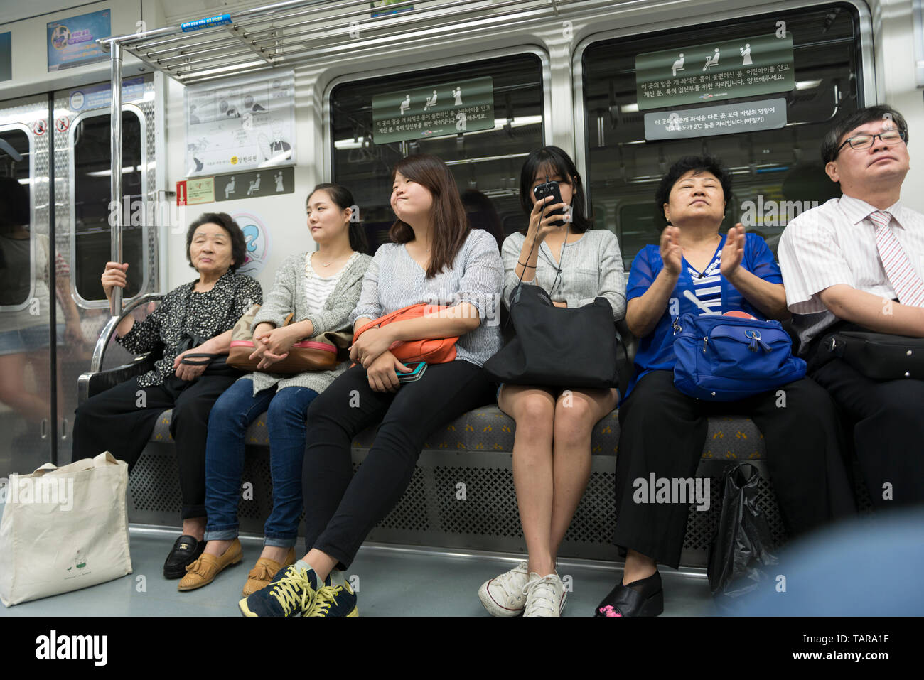 Crossed legs train hi-res stock photography and images - Alamy