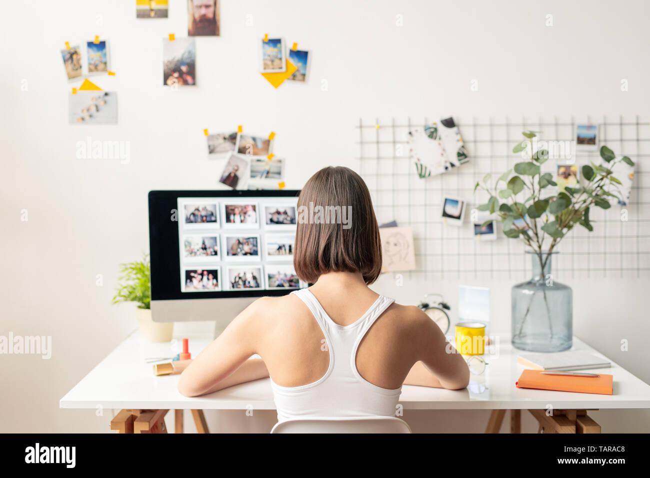 Designer by desk Stock Photo - Alamy