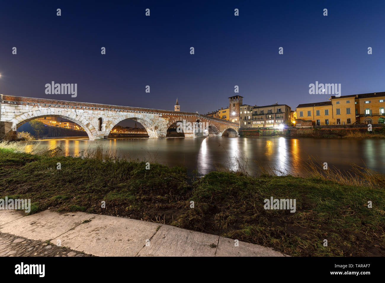 Ponte Pietra at night (Stone bridge). I century B.C. - the oldest Roman ...