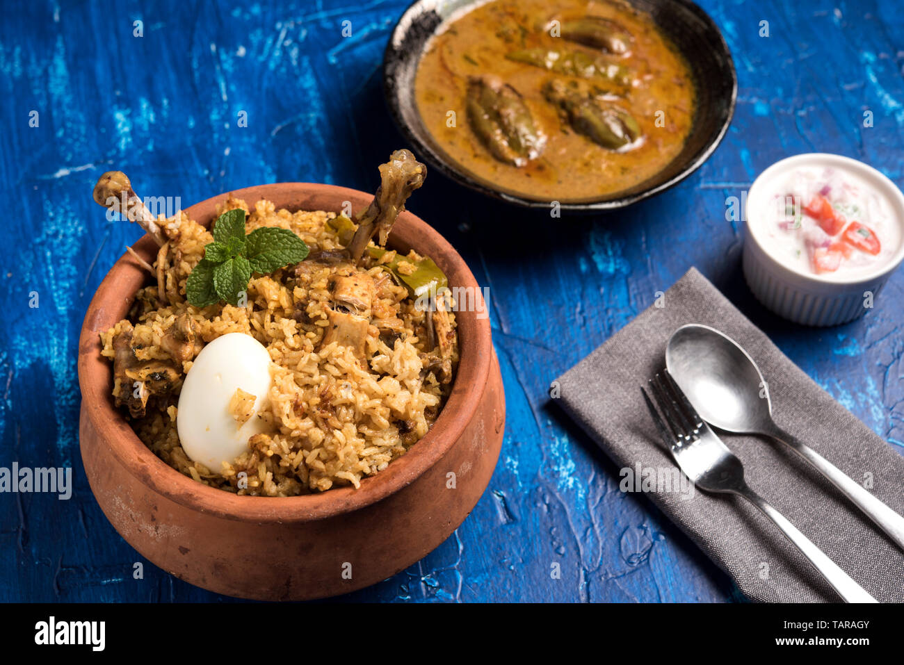 Dum biryani hi-res stock photography and images - Alamy