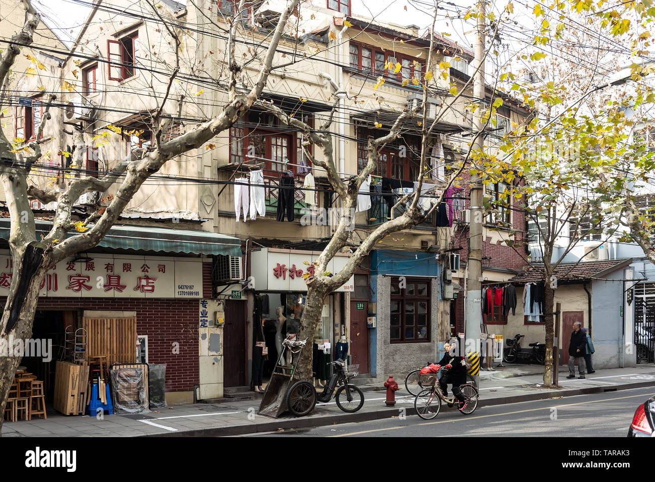 Living Scene on the Streets of Shanghai with Houses Stock Photo - Alamy