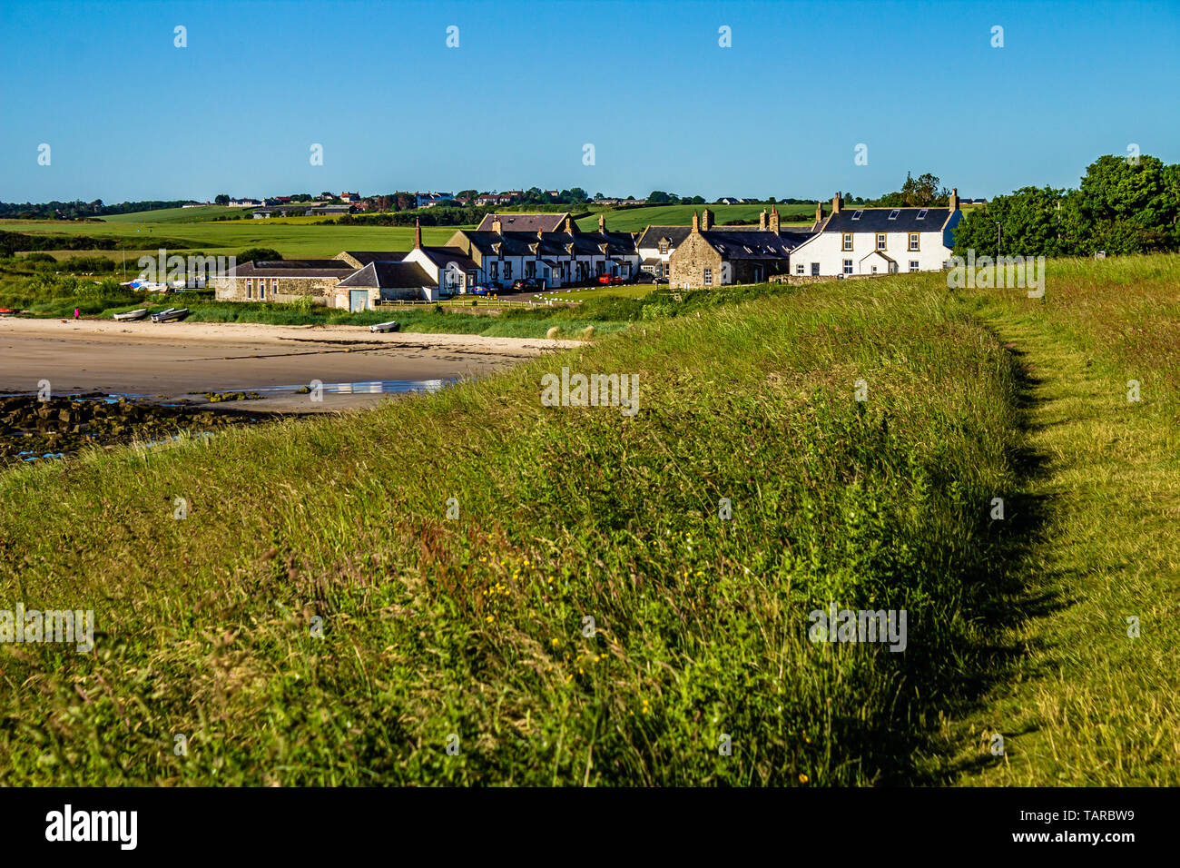 Coastal village of Low Newton-by-the-Sea, Northumberland, UK. Summer ...