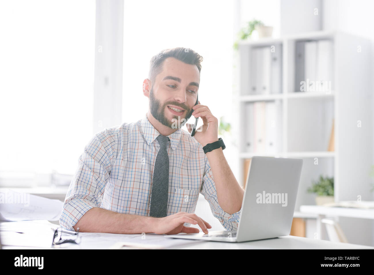 Engineer by desk Stock Photo - Alamy