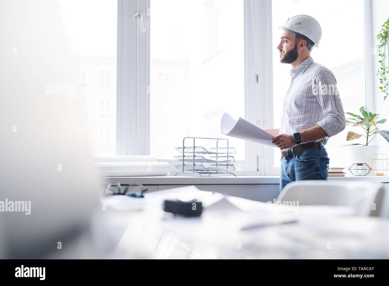 Engineer working in office Stock Photo - Alamy