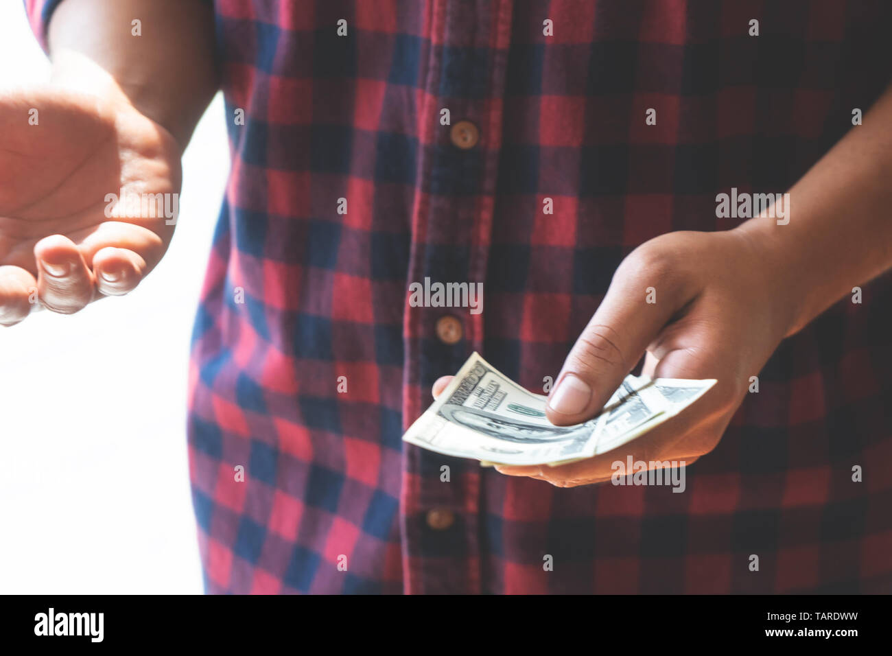 Handing over payment business hi-res stock photography and images - Alamy