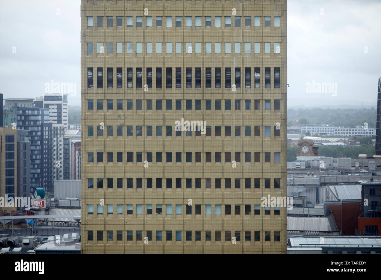 Manchester Arndale House, yellow tiled office building Stock Photo - Alamy