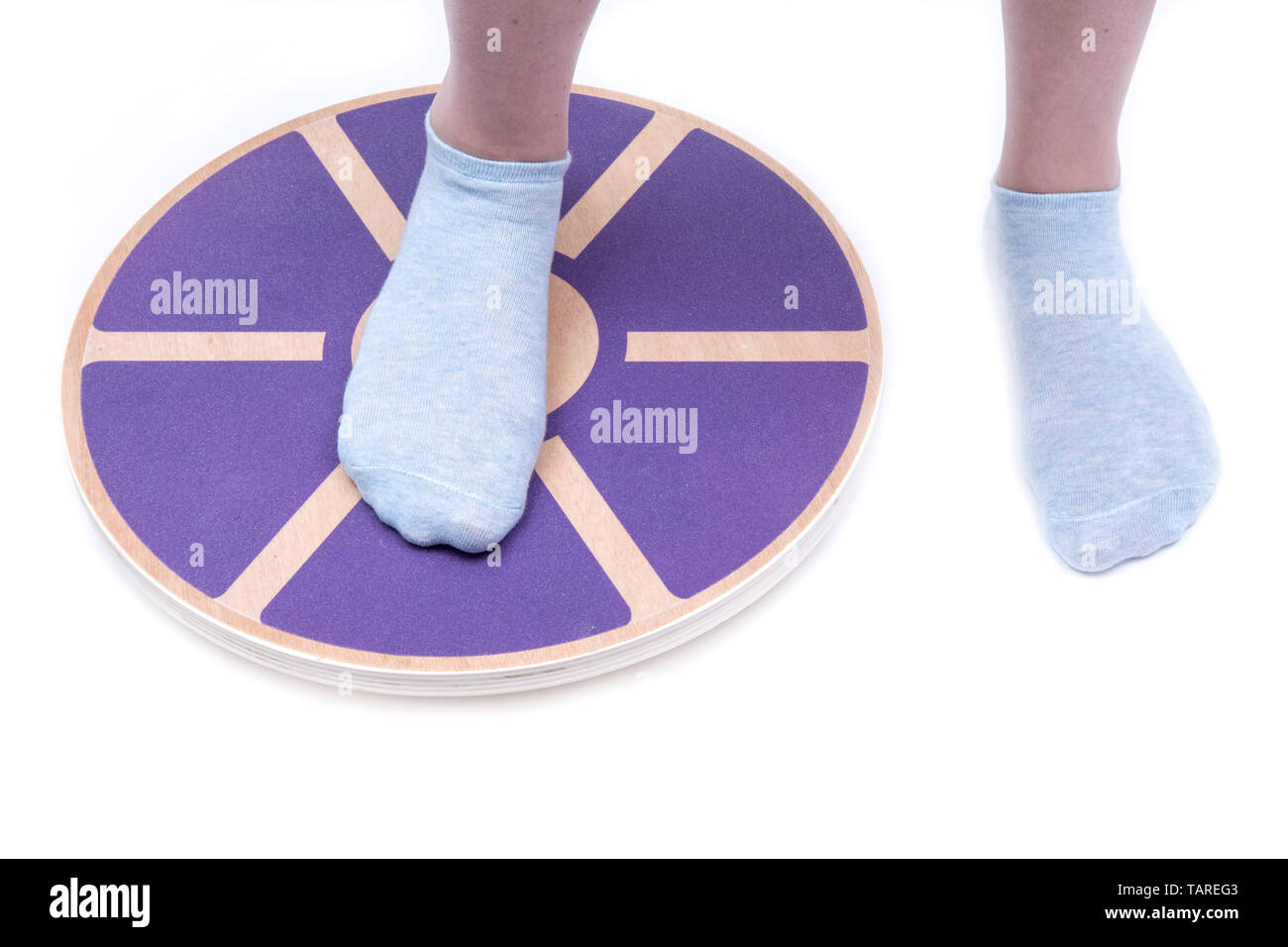 Woman's foot on Wooden Wobble Balance Board Exercise Core Fitness ...