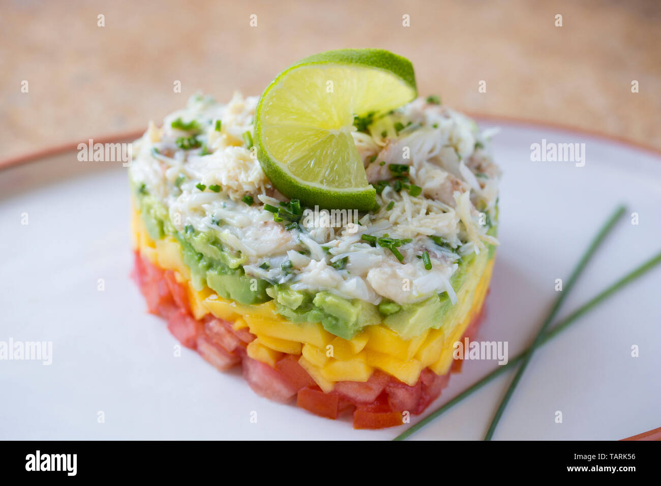 A homemade spider crab meat stack made in a heart-shaped mould ...