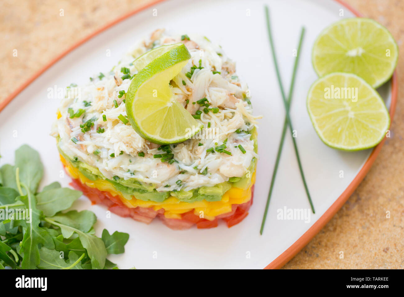 A homemade spider crab meat stack made in a heart-shaped mould ...
