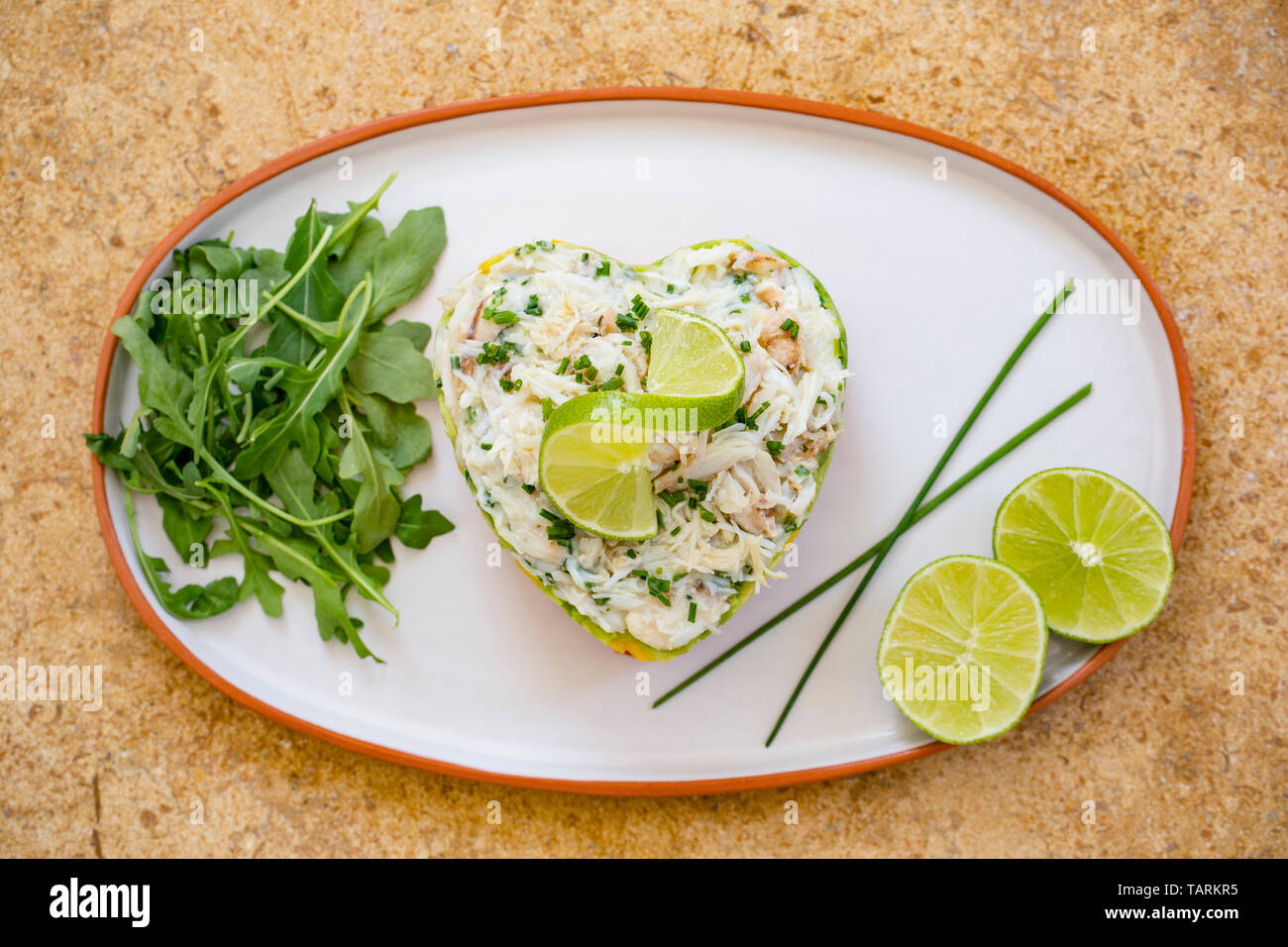 A homemade spider crab meat stack made in a heart-shaped mould ...