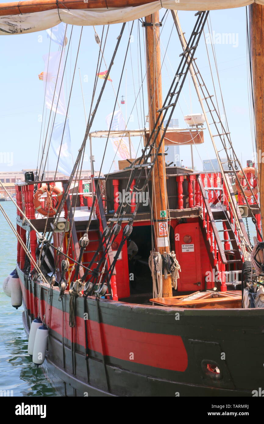 This is the only red olored boat in the harbor Stock Photo - Alamy