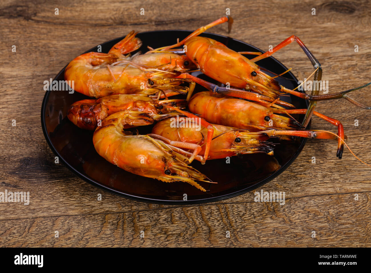 Grilled Asian water prawn in the plate Stock Photo - Alamy
