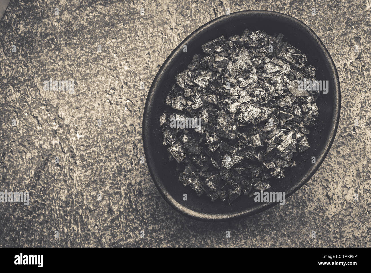 Black Salt Crystals on Dark Texture Background Stock Photo - Alamy
