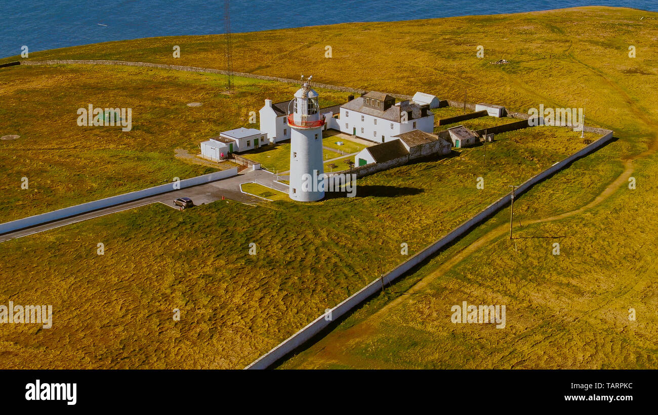 Flight around the lighthouse at Loop Head on the Irish west coast ...