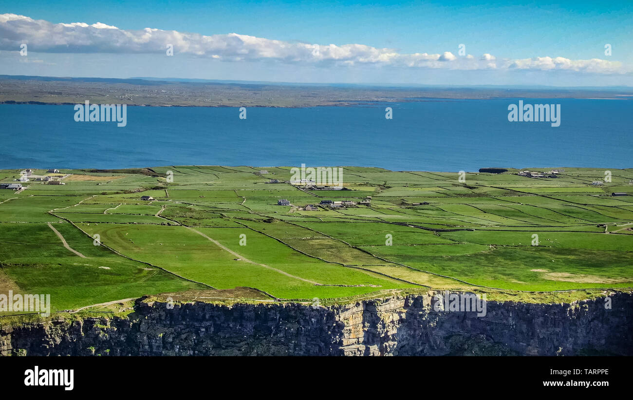 The green lands at the Cliffs of Moher in Ireland - travel photography ...
