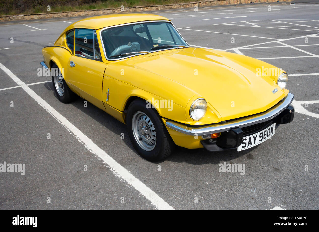A classic Yellow Truimph GT6 Coupe Sports car registered 1973/4 Stock ...