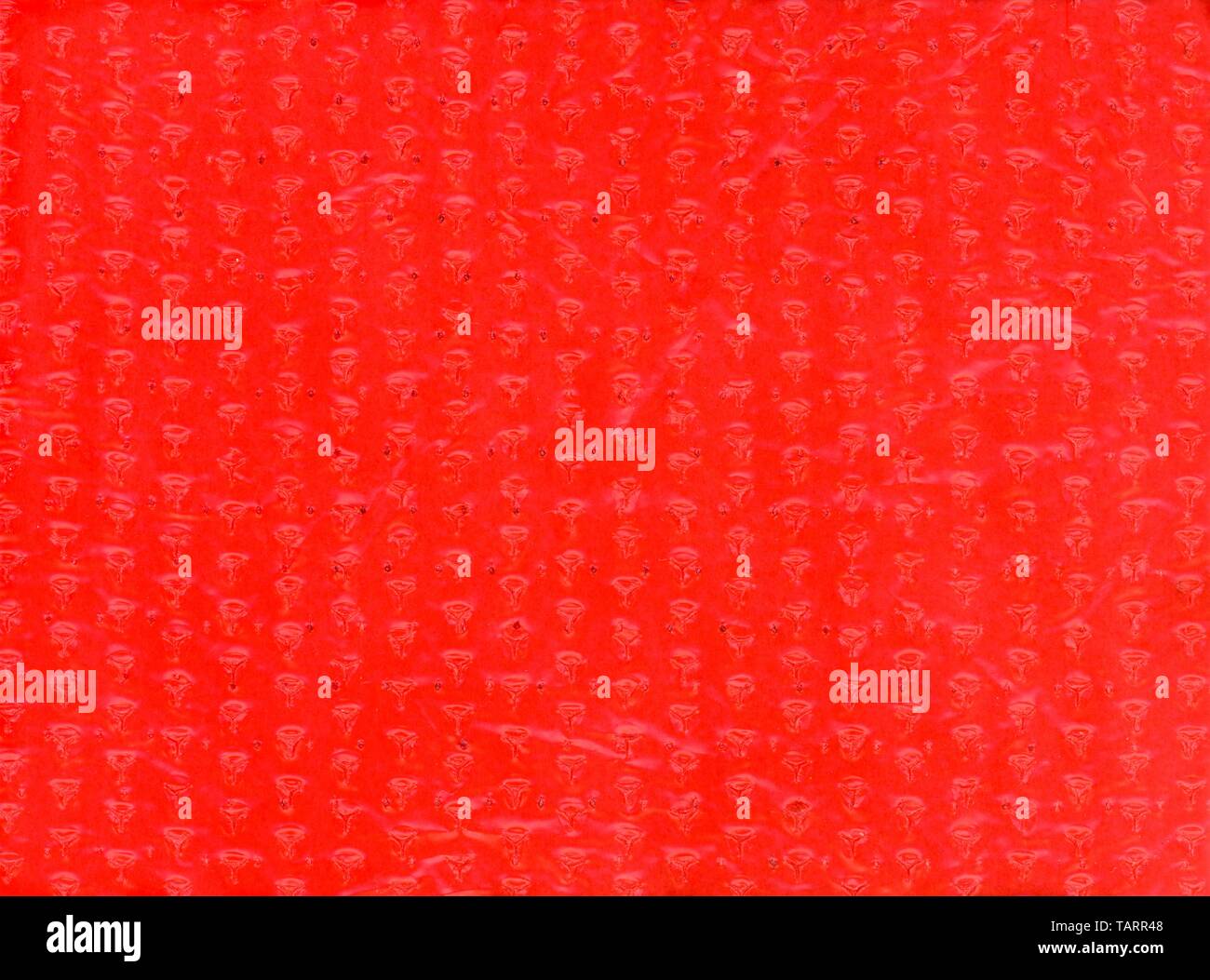 red plastic texture useful as a background Stock Photo - Alamy