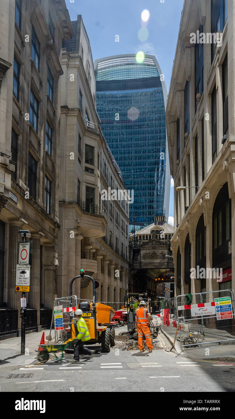 Workmen doing repair work to the road on Whittington Avenue in the ...
