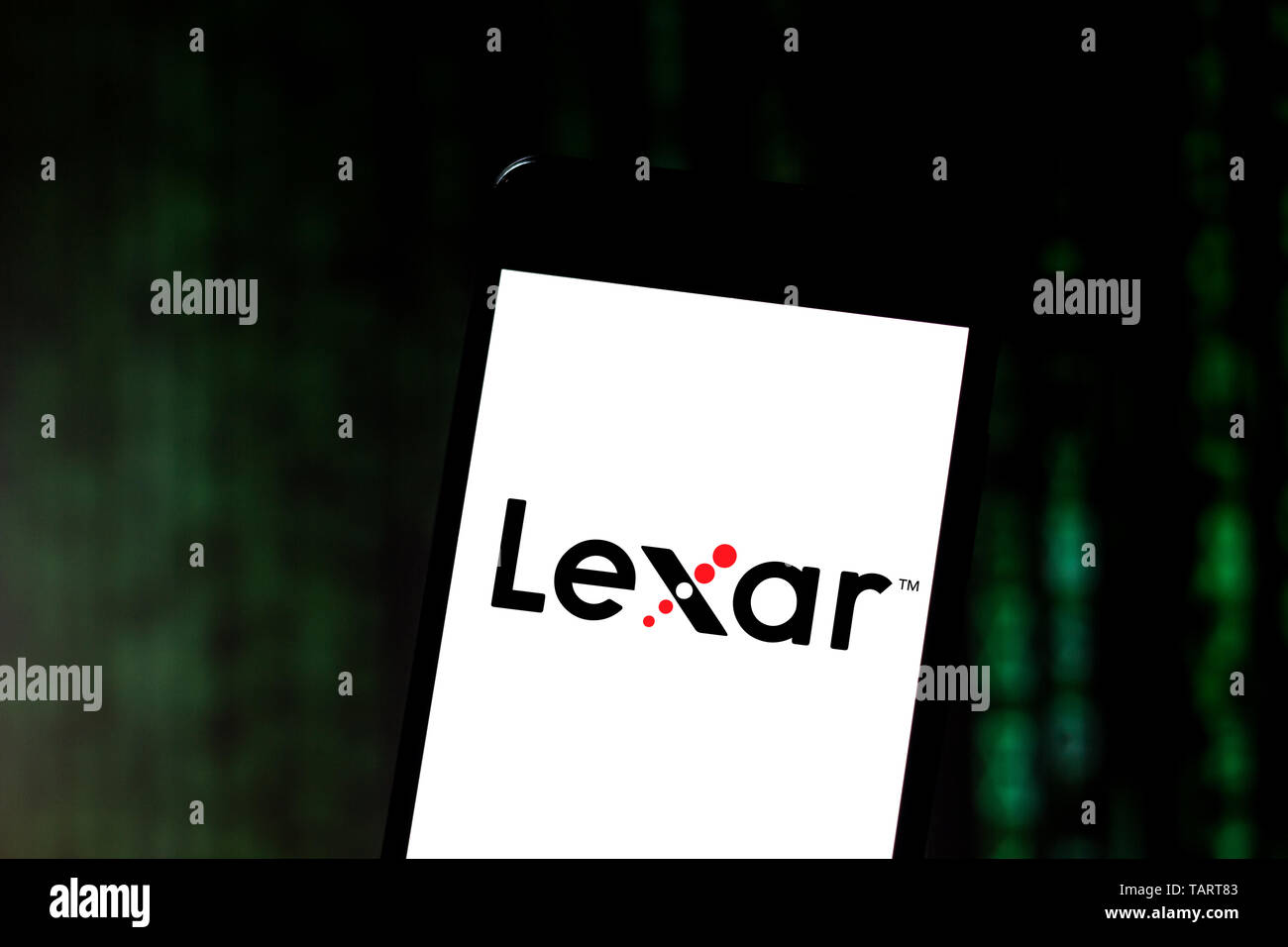 In this photo illustration the Lexar logo is seen displayed on a ...