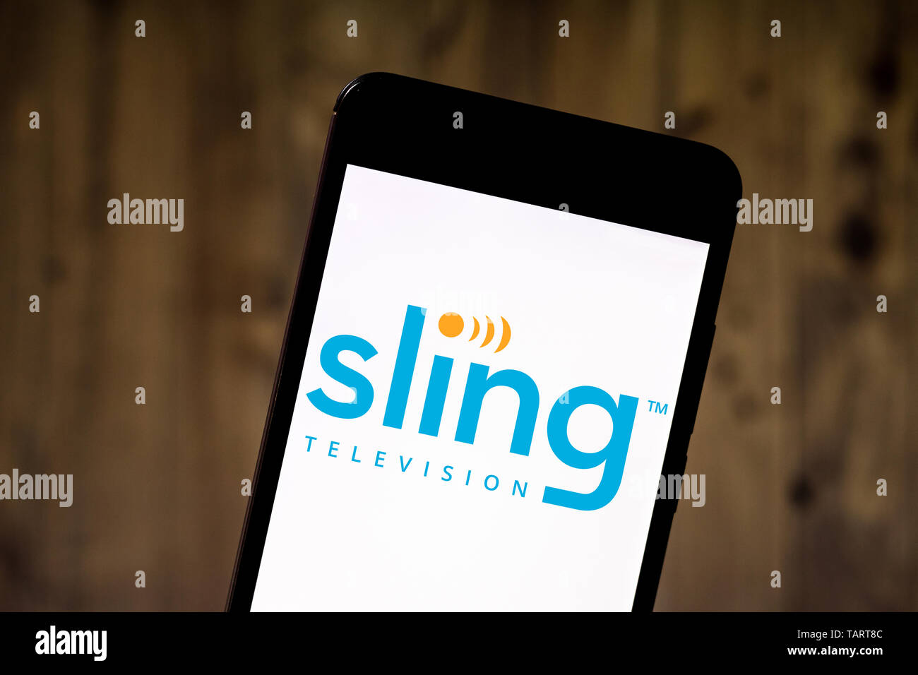 In this photo illustration the Sling Television logo is seen displayed ...