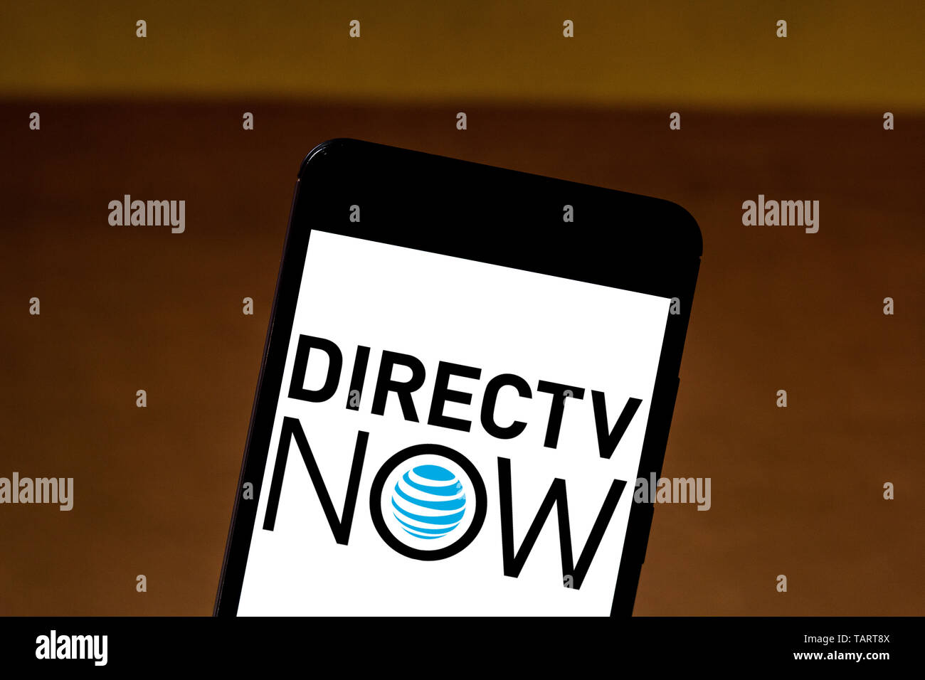 In this photo illustration the DirecTV Now logo is seen displayed on a ...