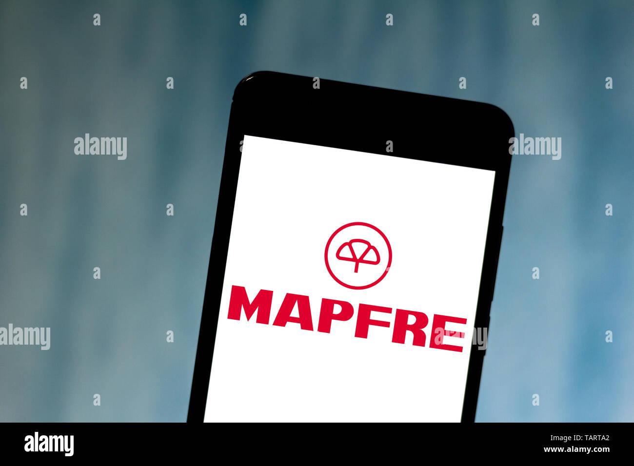 In this photo illustration the MAPFRE logo is seen displayed on a ...