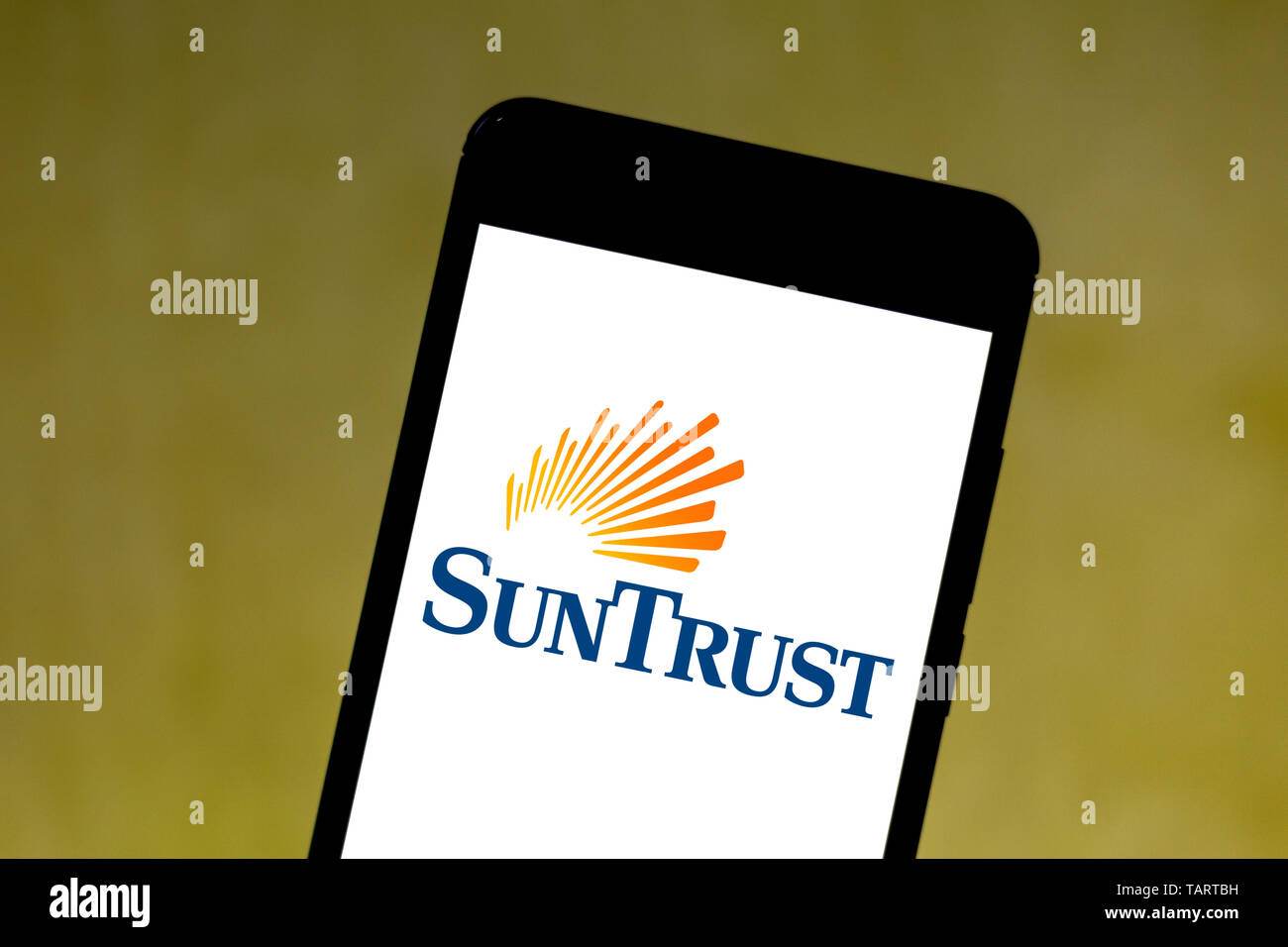 In this photo illustration the SunTrust Banks logo is seen displayed on ...
