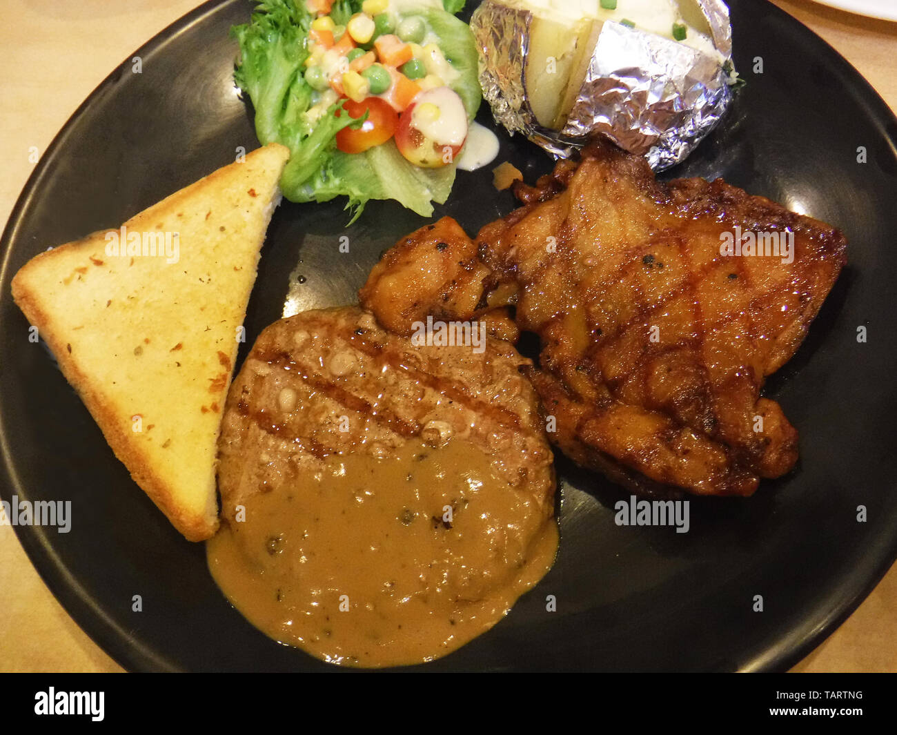 chicken and beef steak Stock Photo - Alamy