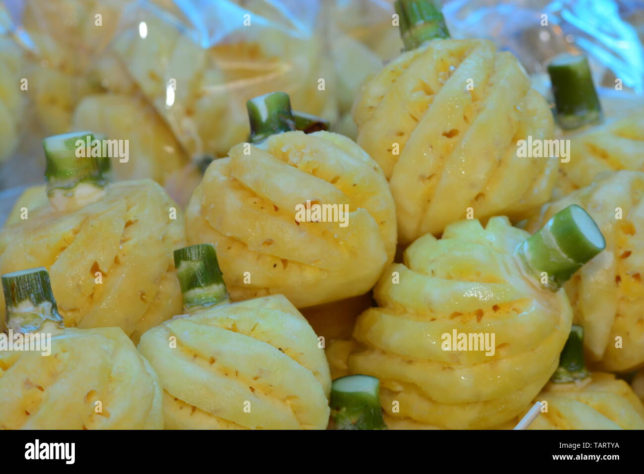 Group of pineapple fruit background Stock Photo - Alamy