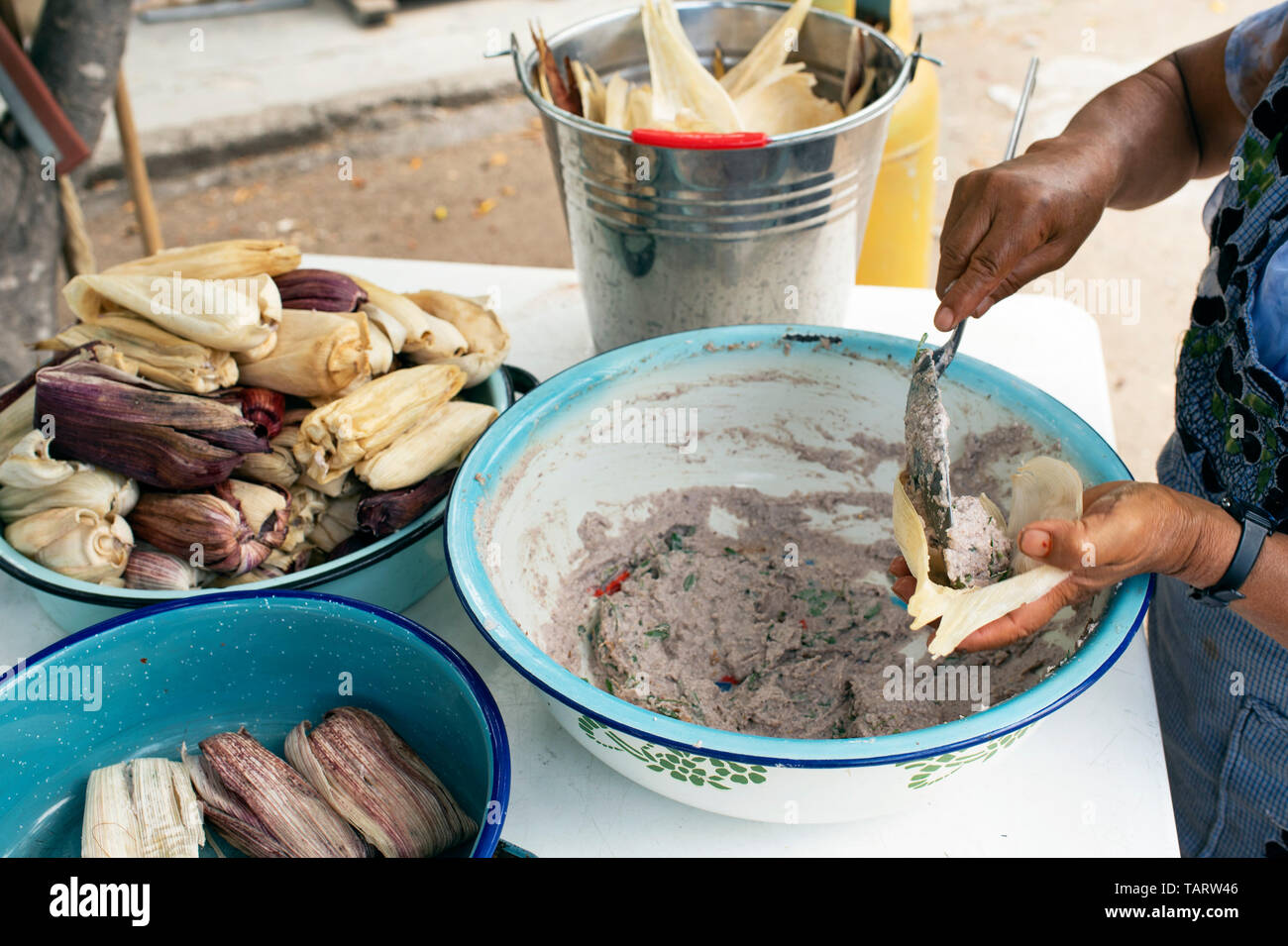 Woman making tamales for the family. Teotitlan del Valle, Oaxaca ...