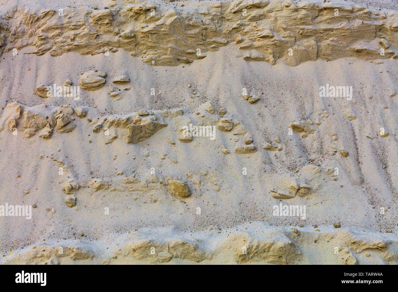 Sandy cascades of a sandy mountain, background and texture of yellow ...