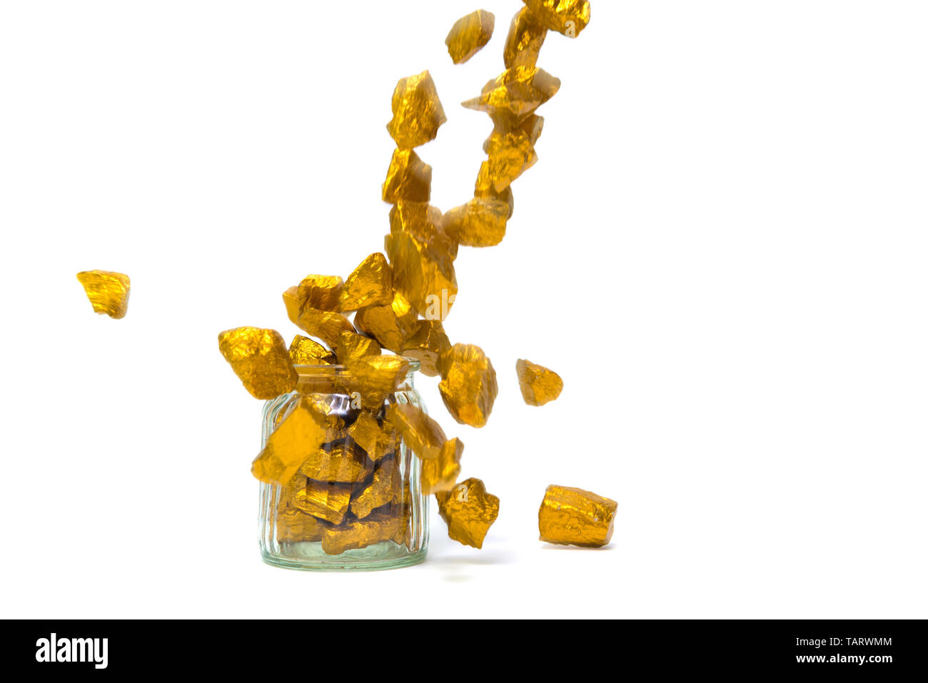 Falling gold nuggets, gold ore , precious stone or lump of golden stone ...