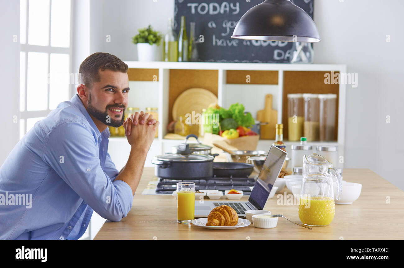 a business man breakfasts with notebook and juice Stock Photo - Alamy