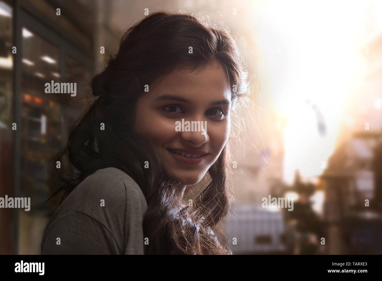 Woman standing outdoors hi-res stock photography and images - Alamy