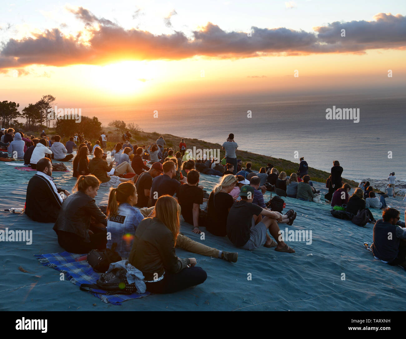 Locals and tourist enjoying the beautiful sunset from the top of Signal ...