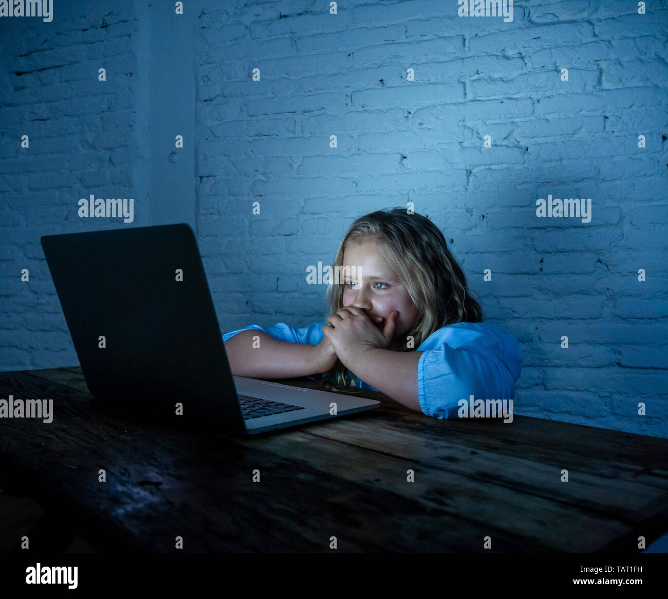 Scared sad girl bullied on line with laptop suffering cyber bullying ...