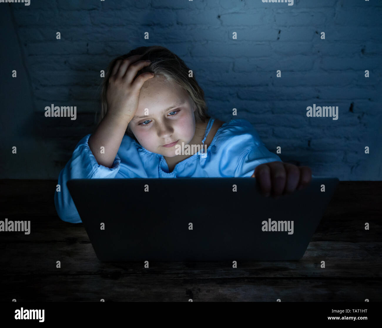 Scared sad girl bullied on line with laptop suffering cyber bullying ...