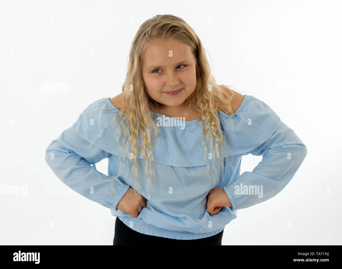 Close up portrait of a cute pretty child looking angry and disappointed ...