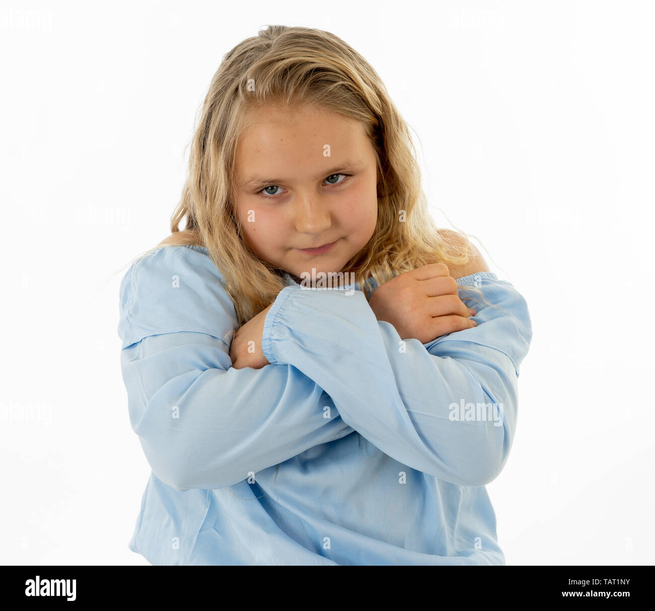 Close up portrait of a cute pretty child looking angry and disappointed ...