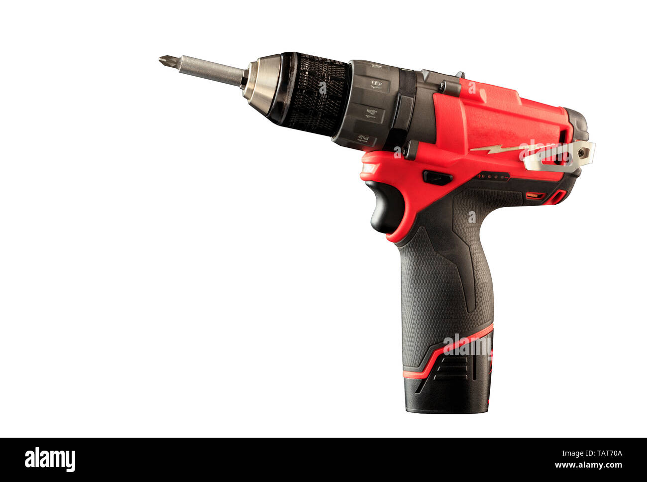 Cordless drill driver in red with rubberized handle in profile ...