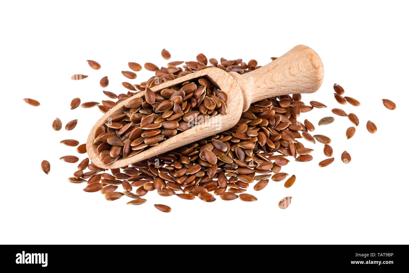 Pile of flax seeds isolated on white background, close-up of flaxseed in wooden scoop Stock ...