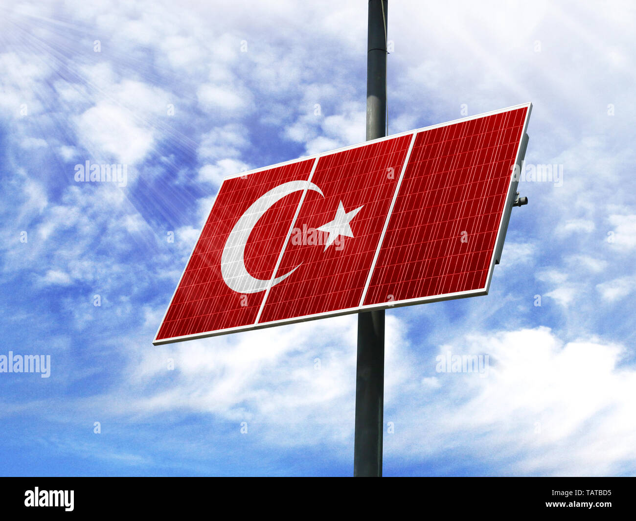 Solar panels against a blue sky with a picture of the flag of Turkey ...