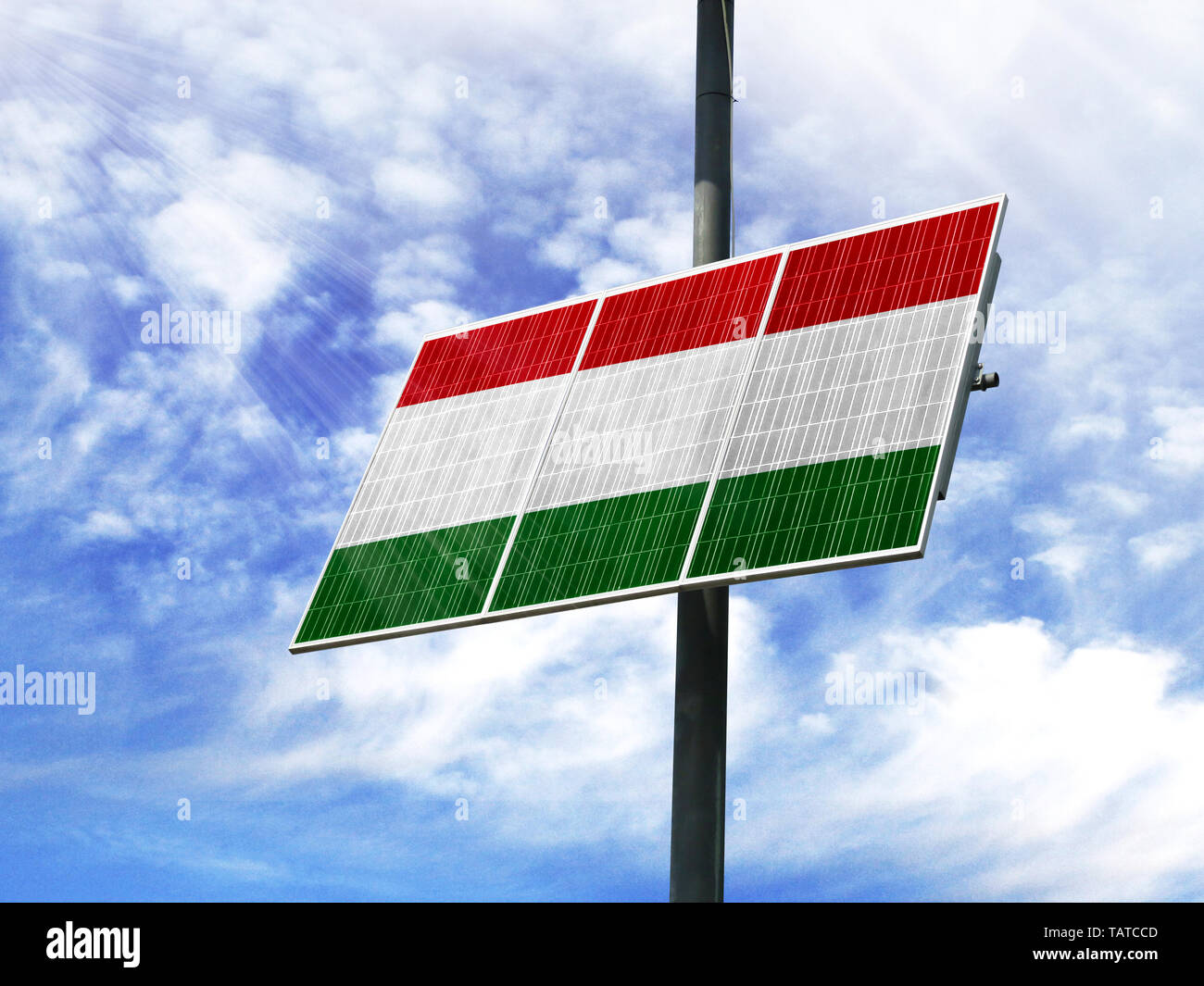Solar panels against a blue sky with a picture of the flag of Hungary ...