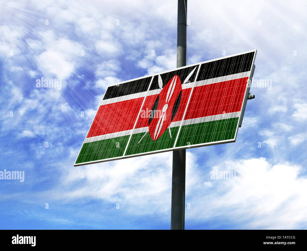 Solar panels against a blue sky with a picture of the flag of Kenya ...