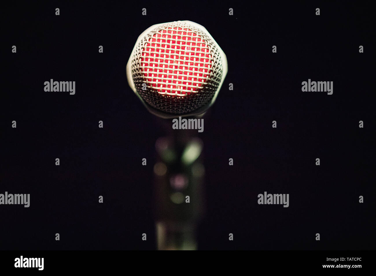 Microphone on Blur Colored Background Stock Photo - Alamy