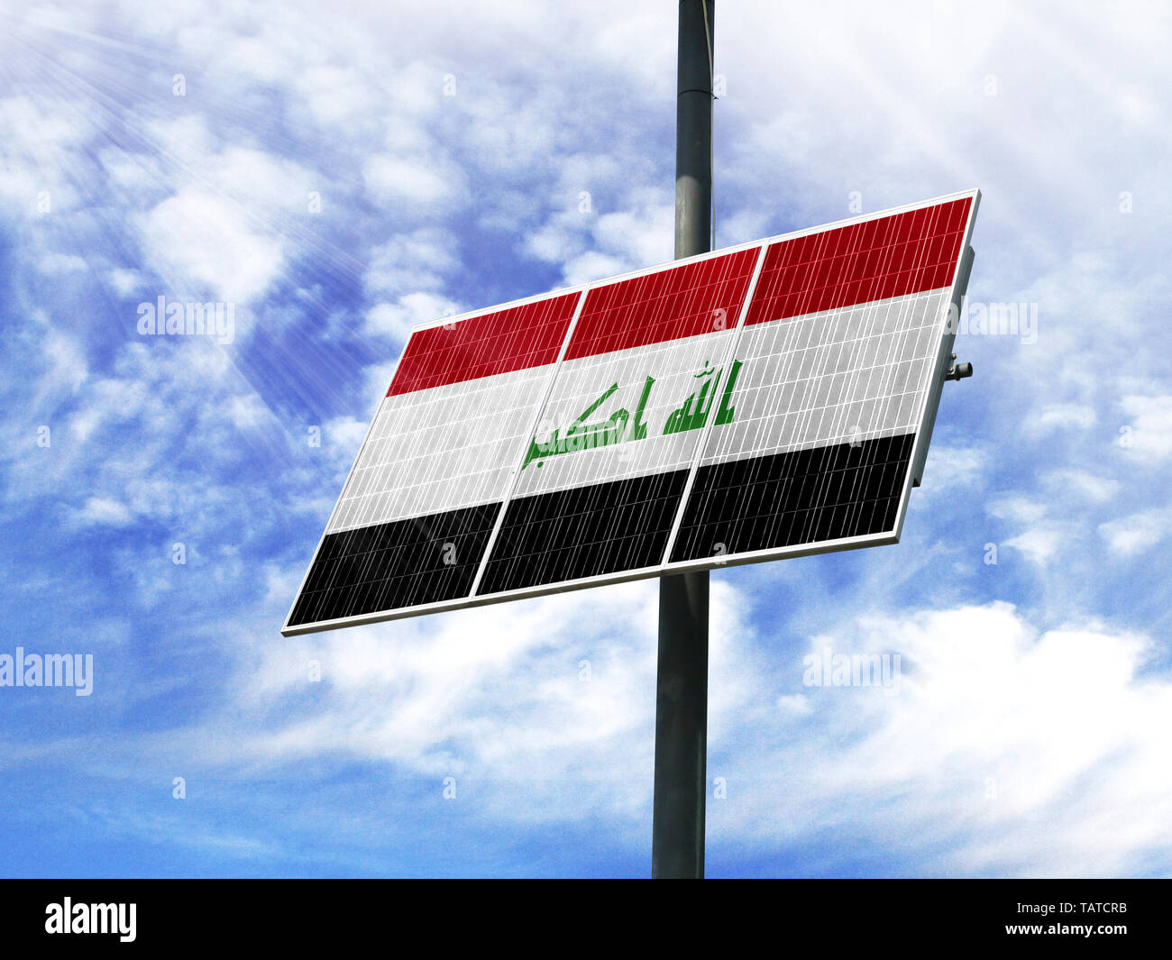 Solar panels against a blue sky with a picture of the flag of Iraq ...