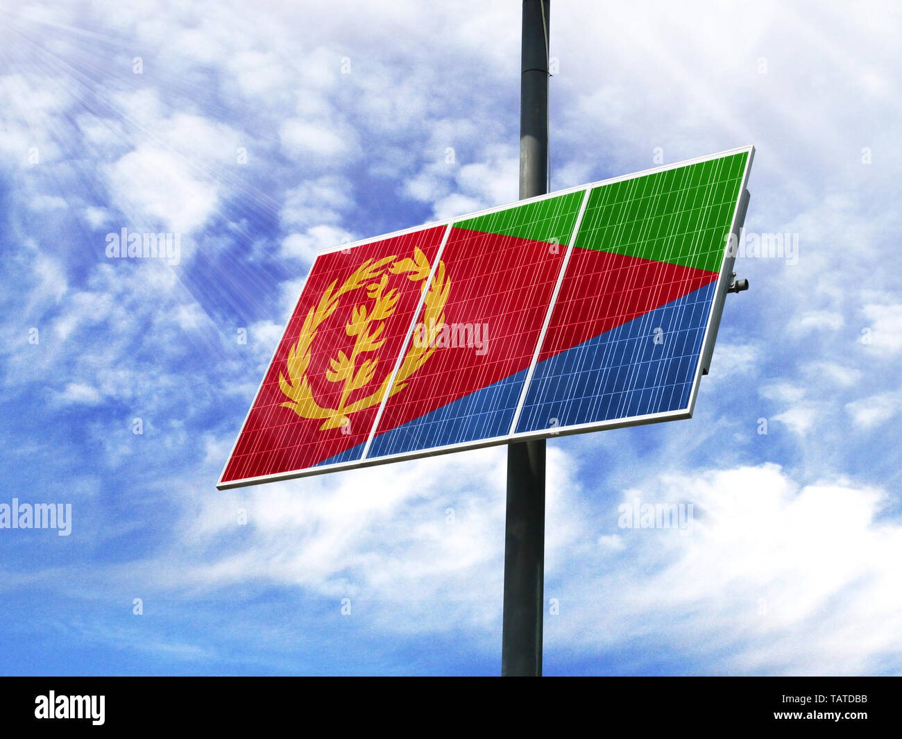 Solar panels against a blue sky with a picture of the flag of Eritrea ...