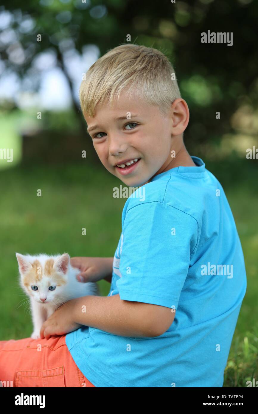 boy and kitten Stock Photo - Alamy