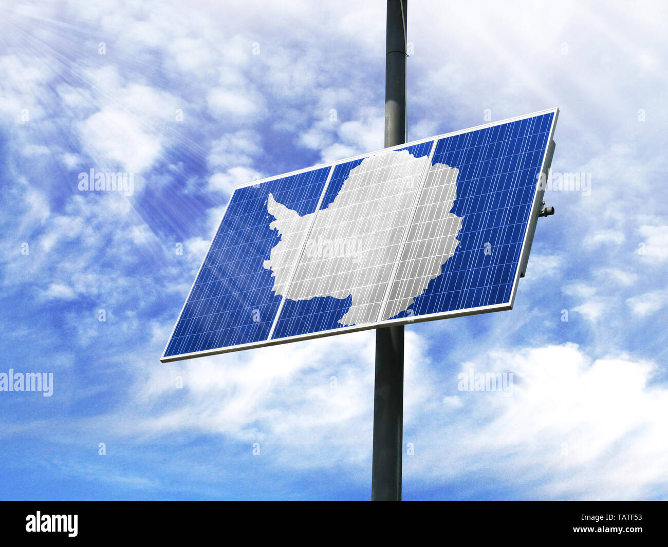 Solar panels against a blue sky with a picture of the flag of Antarctic ...