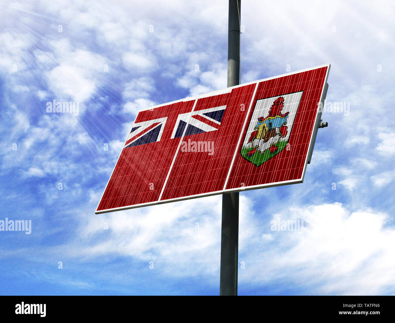 Solar panels against a blue sky with a picture of the flag of Bermuda ...